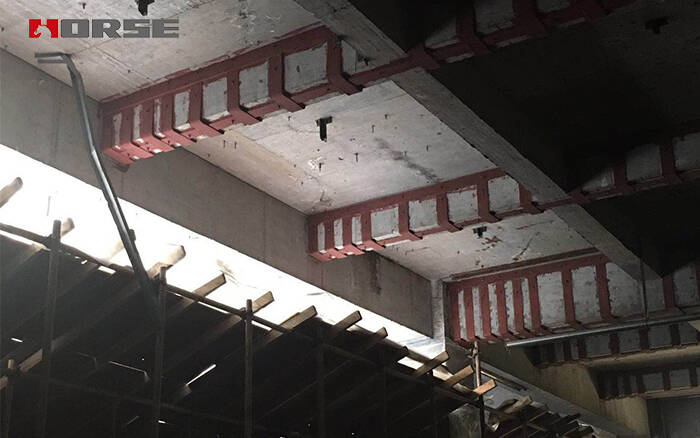 Strengthening scheme for damaged frame beam by steel strip